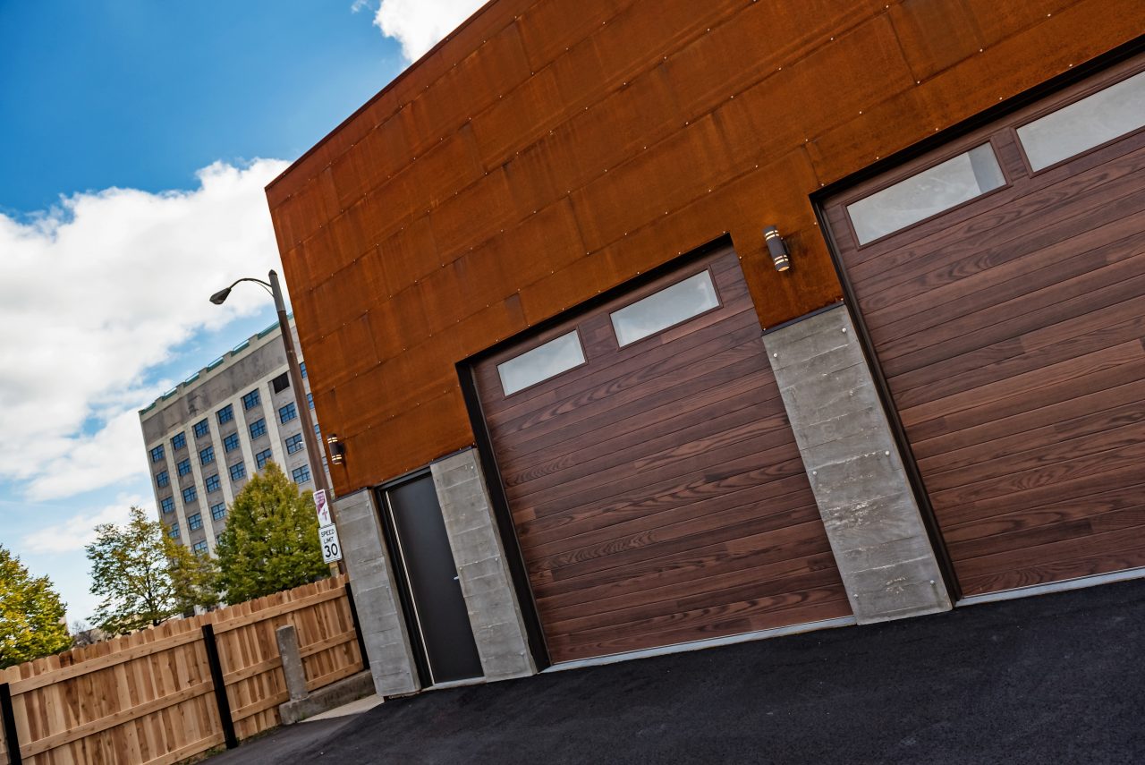 DAC Enterprise, Inc. | Manufacturer & distributor of custom garage doors.
